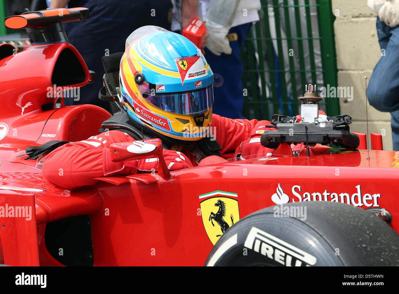 Spanish Formula One driver Fernando Alonso of Ferrari reacts after the ...