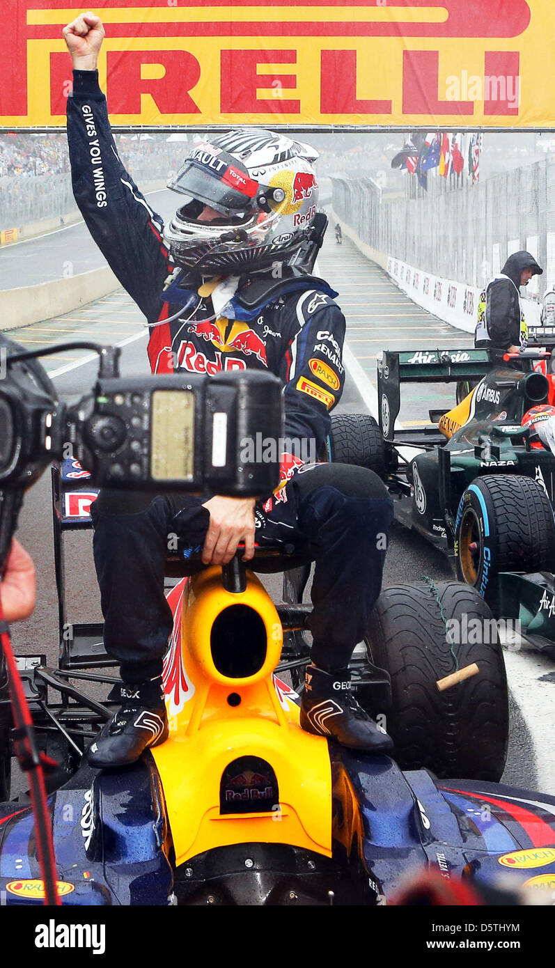 German Formula One driver Sebastian Vettel of Red Bull celebrates his ...