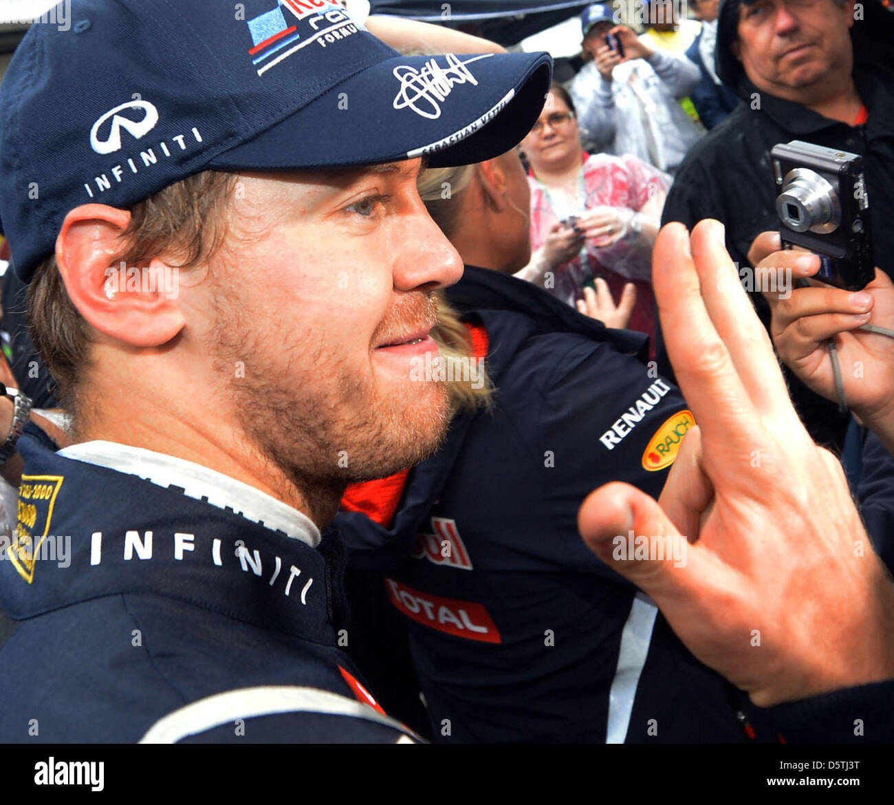 German Formula One driver Sebastian Vettel of Red Bull celebrates his ...