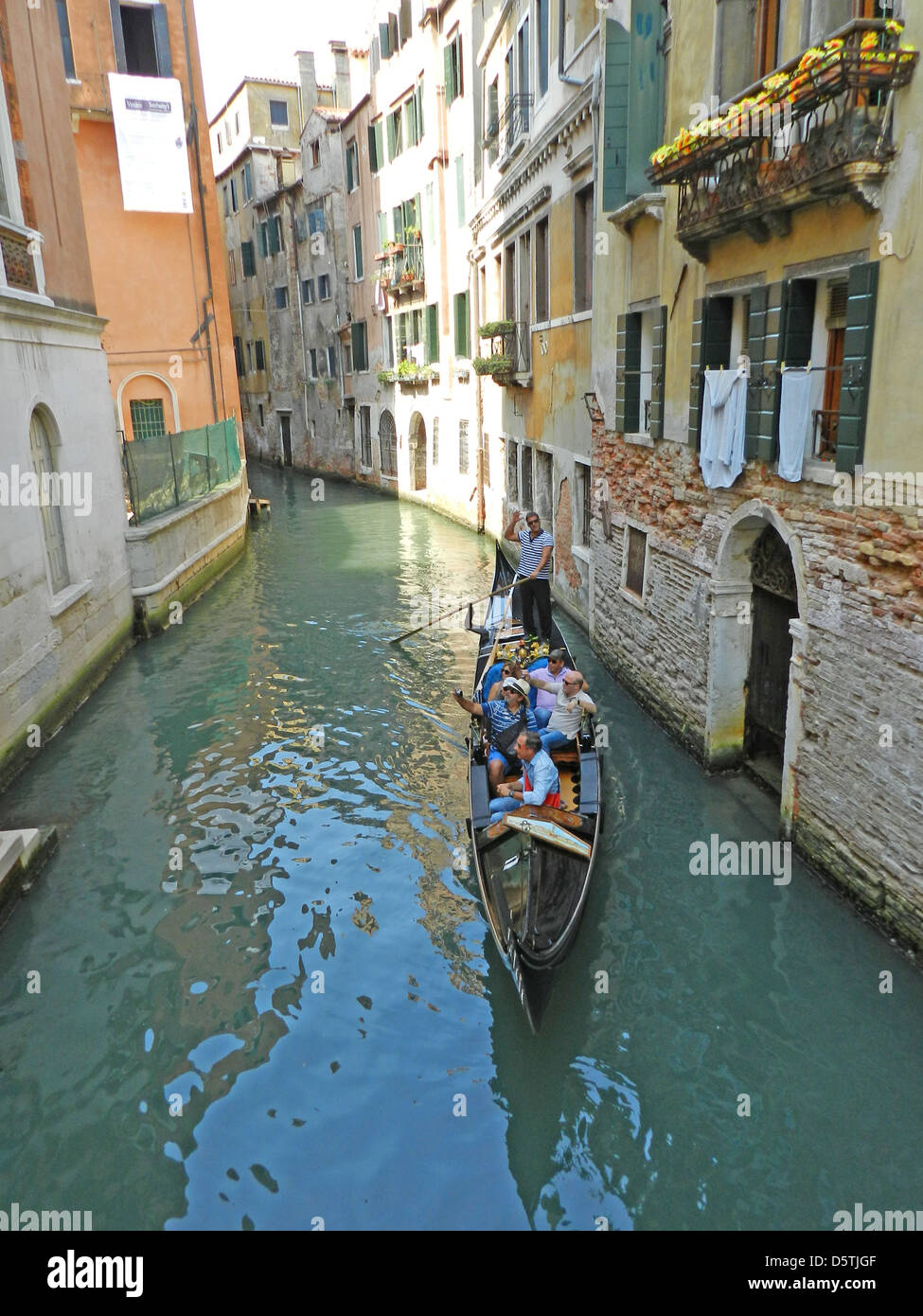 VENICE, Italy. Tourists ona gondola trip. Photo Sheila Gale Stock Photo ...