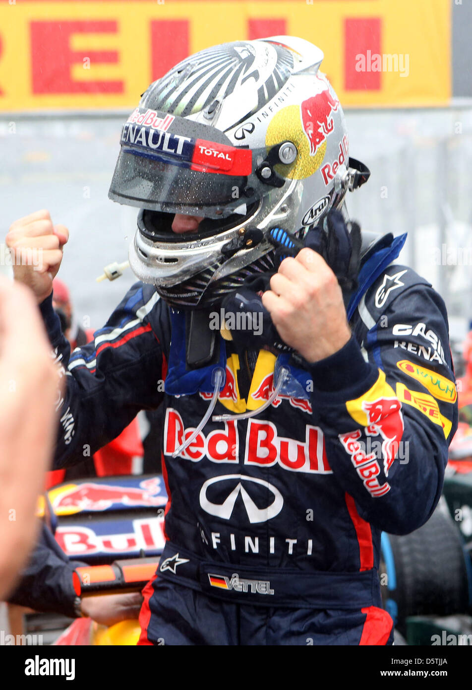 German Formula One driver Sebastian Vettel of Red Bull celebrates his ...