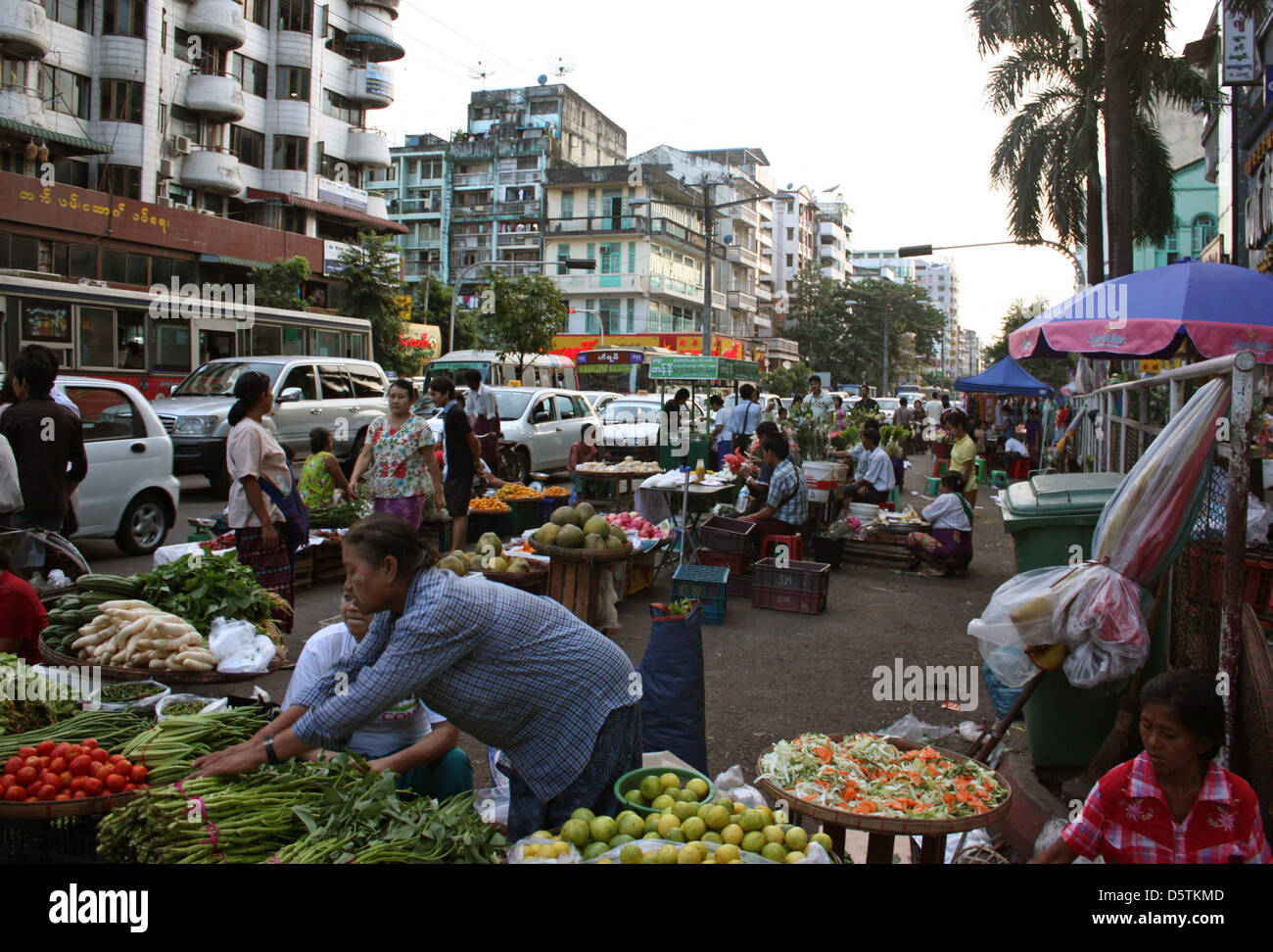 Street life is pictured on Maha Bandoola Road in Chinatown in Yangon ...