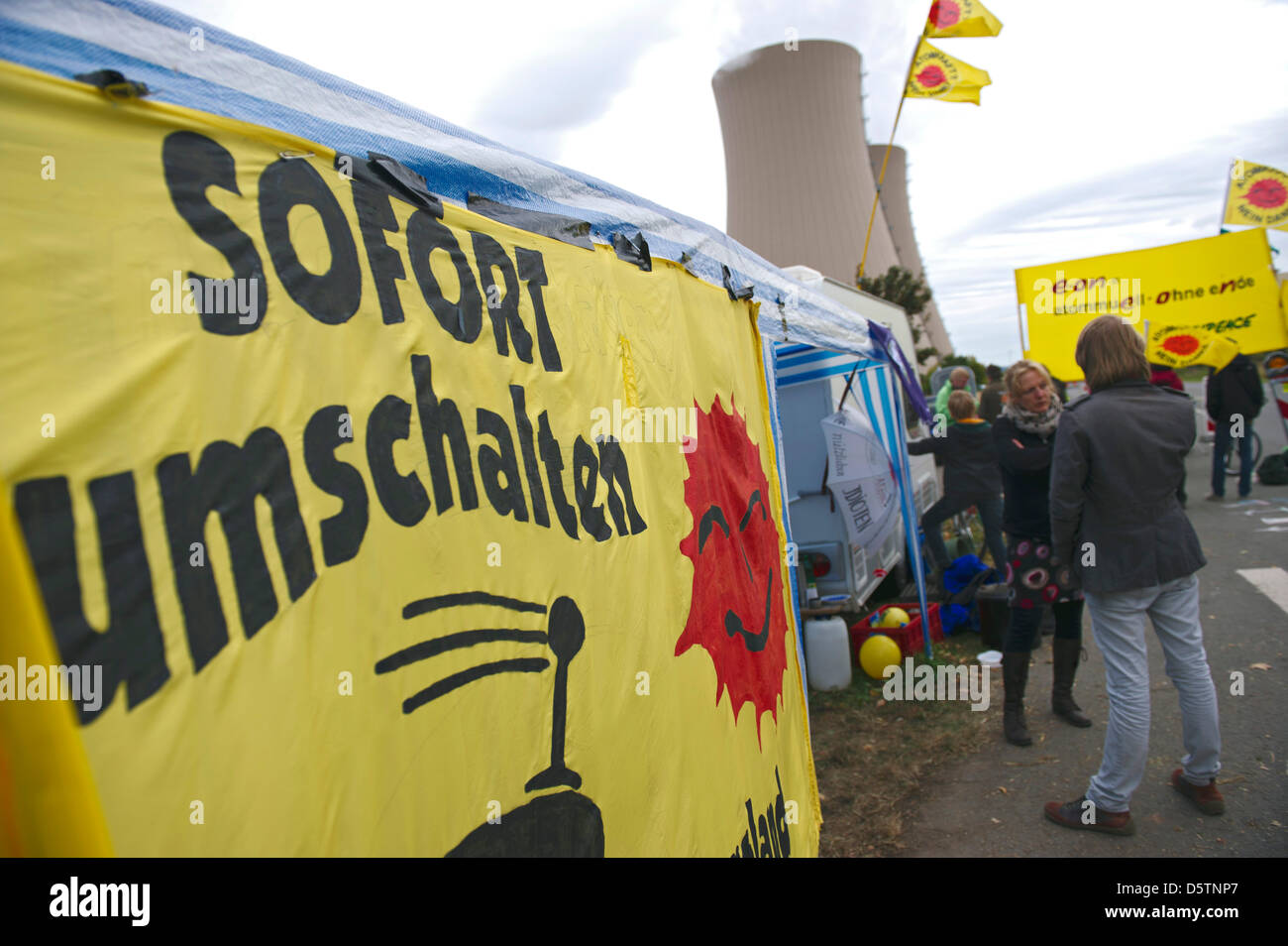 Numerous anti-nuclear activists protest in front of the nuclear power ...