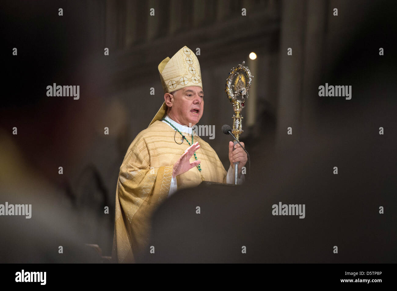 Arch bishop Gerhard Ludwig Mueller speaks inside the cathedral in ...
