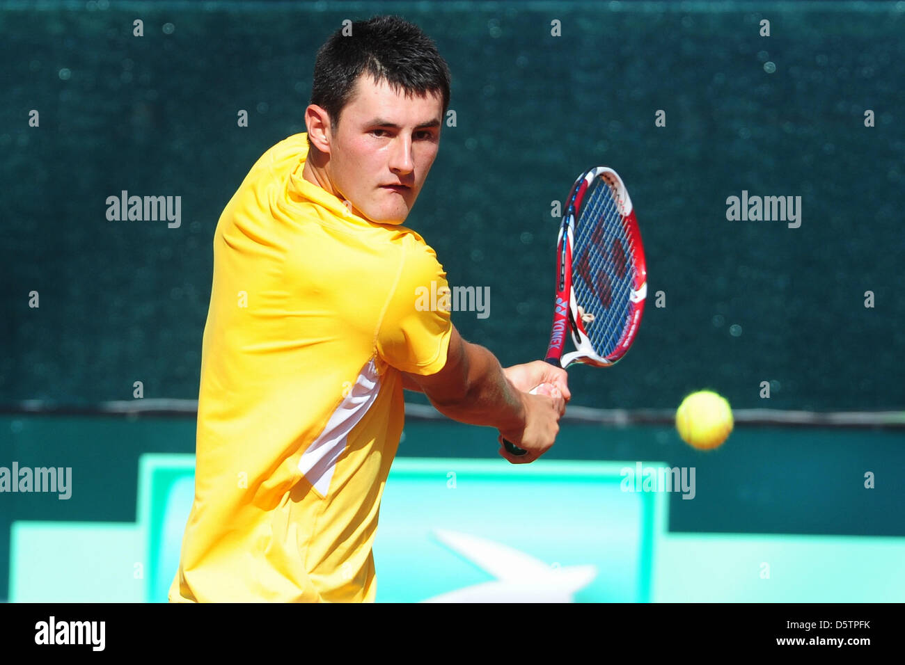 Australia's Bernard Tomic hits a ball during the Tennis Davis Cup ...