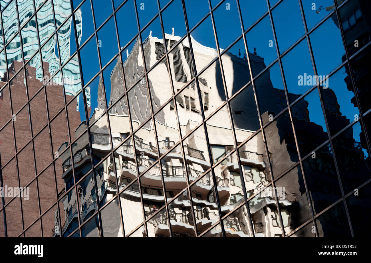 Buildings mirror in a facade of a skyscraper in New York, USA, 23 ...