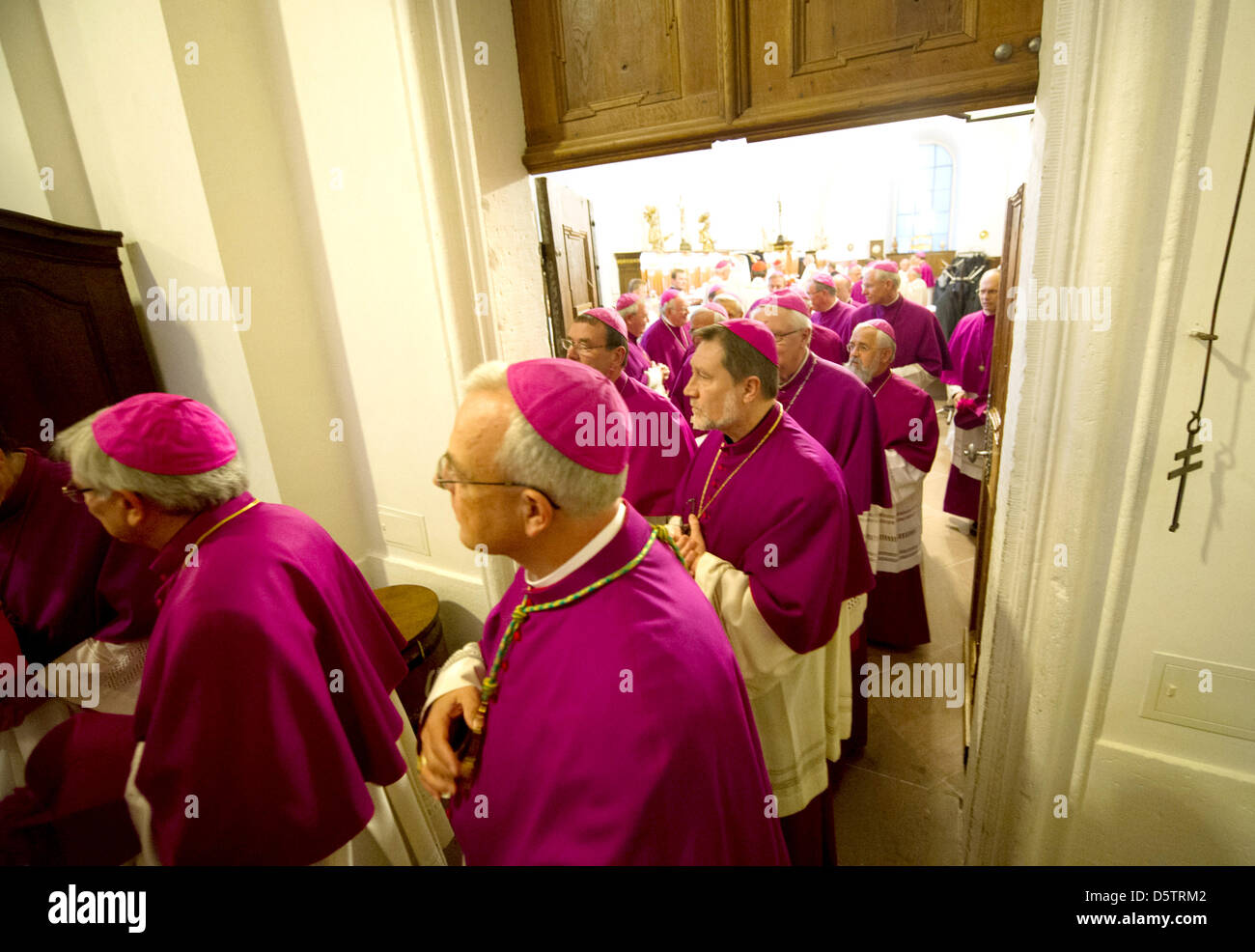 Members the German Bishops' Conference gather in front of the sacristy ...