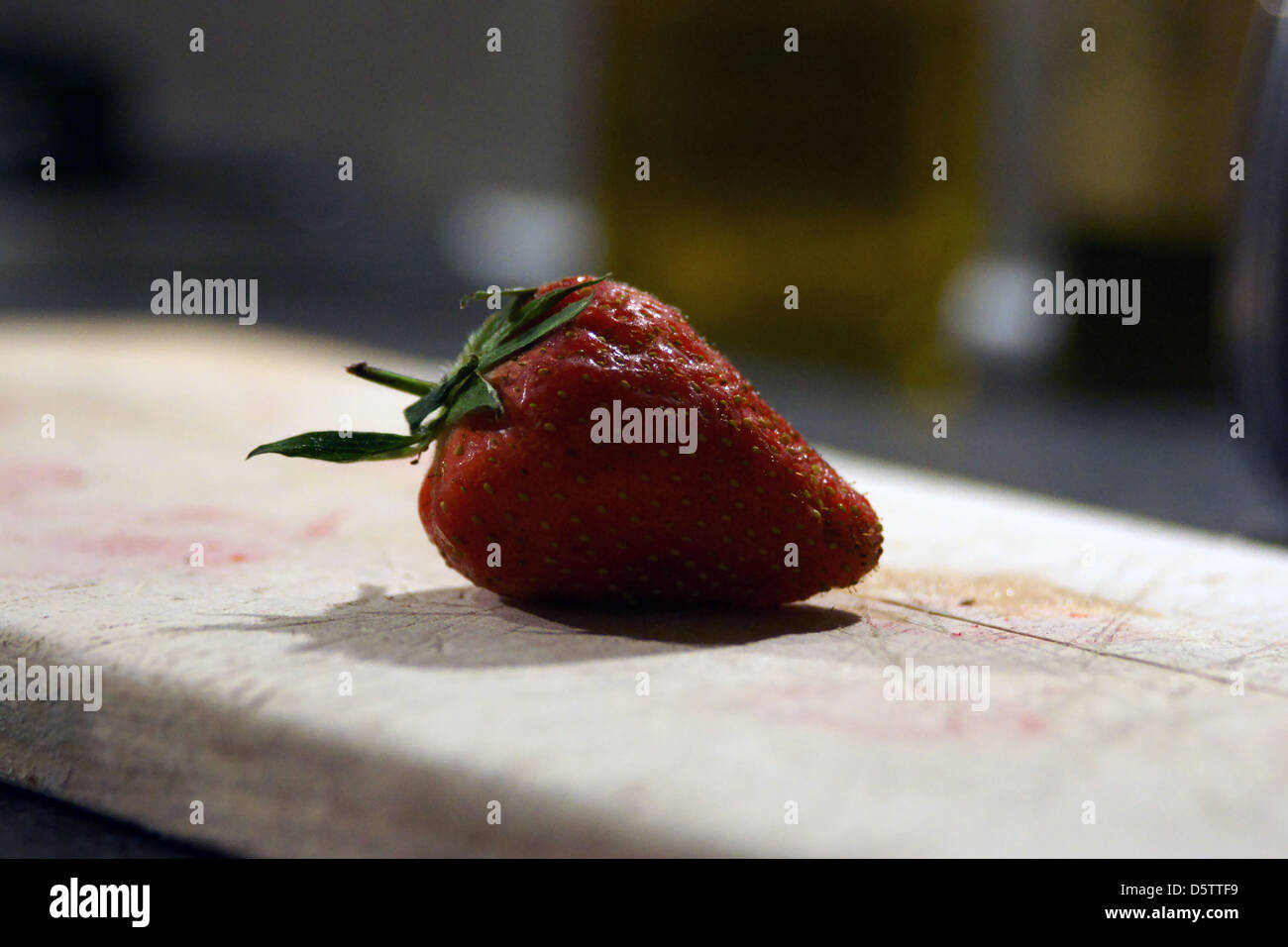 fresh red strawberry cutting board shadows Stock Photo - Alamy