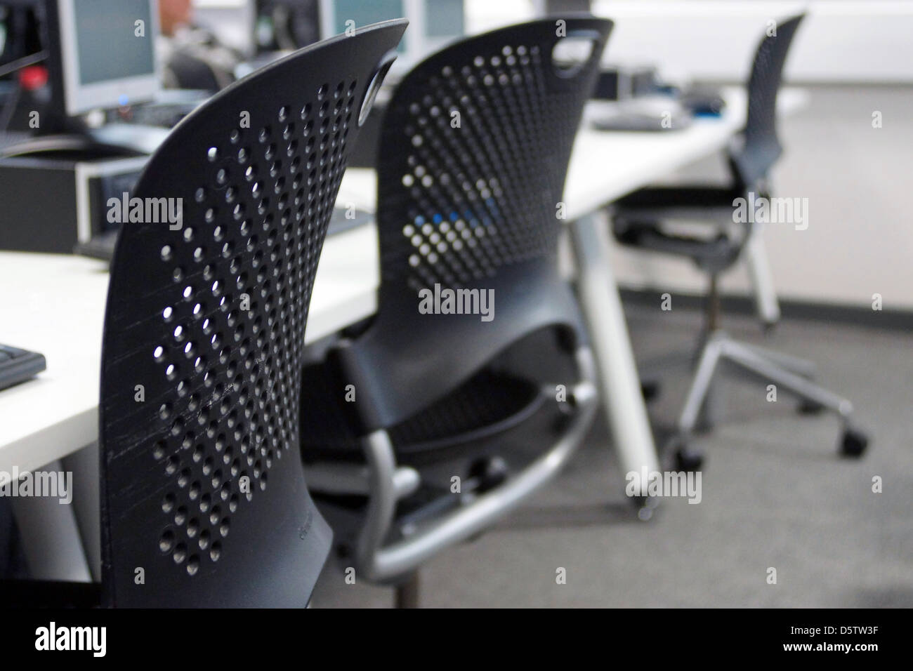 Office room computers chairs meeting room desks Stock Photo - Alamy