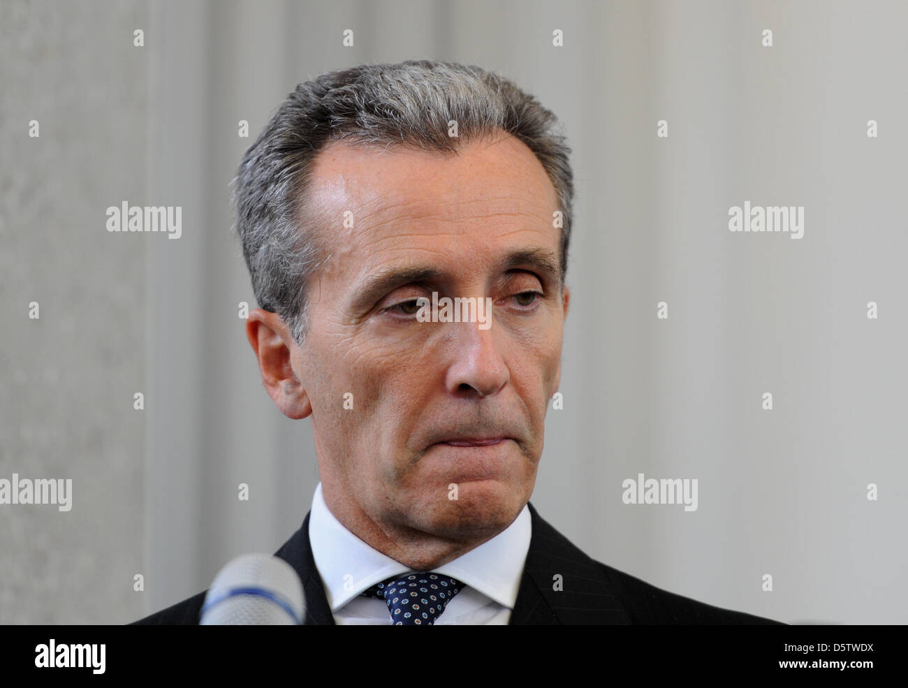 Italian Economy and Finance Minister Vittorio Grilli talks to ...