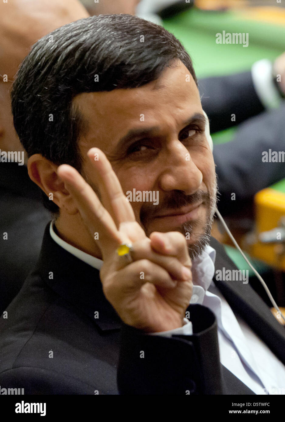 President of the Islamic Republic of Iran Mahmoud Ahmadinejad sits ...