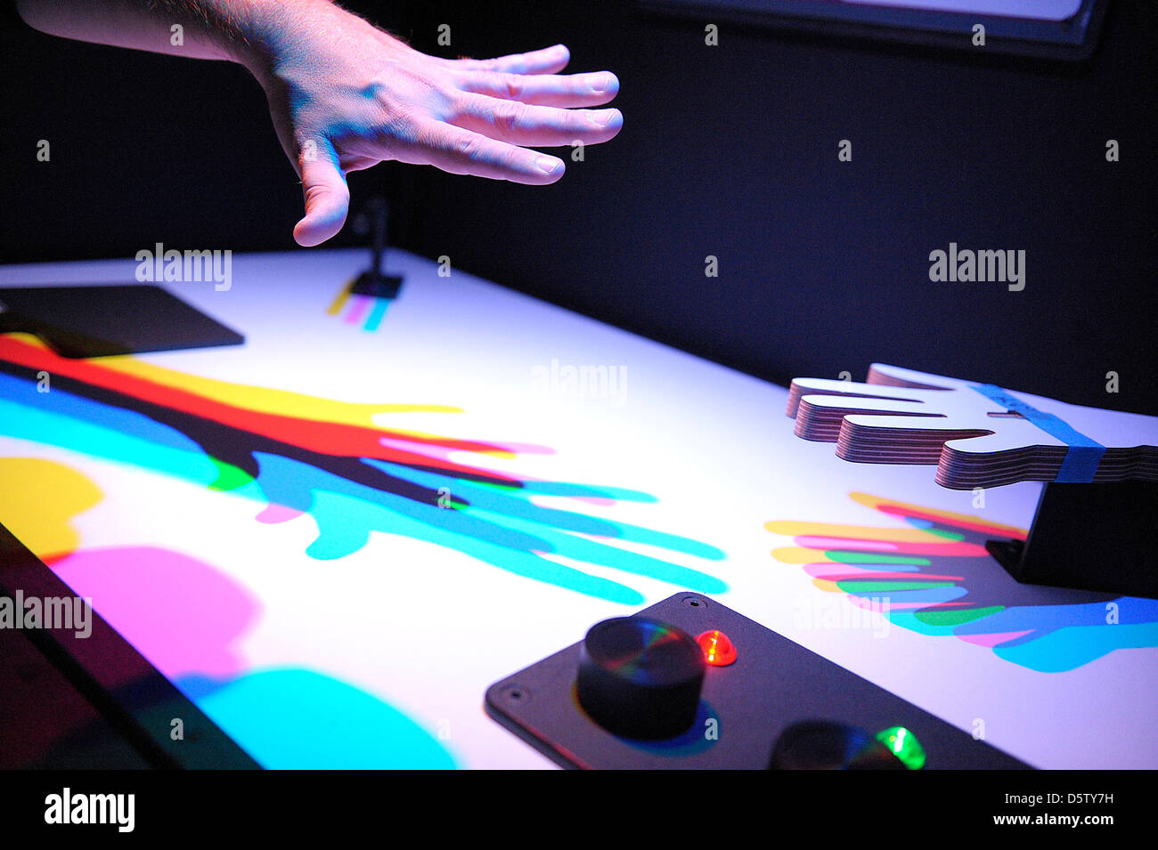 A light installation with coloured shadow is part of the exhibition ...