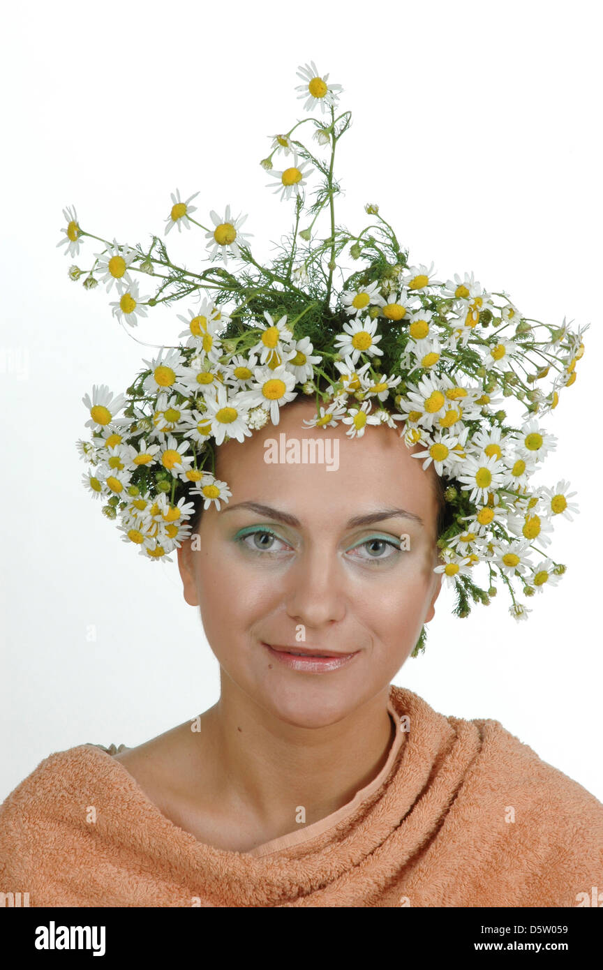 Woman hair decorated with chamomile Stock Photo - Alamy
