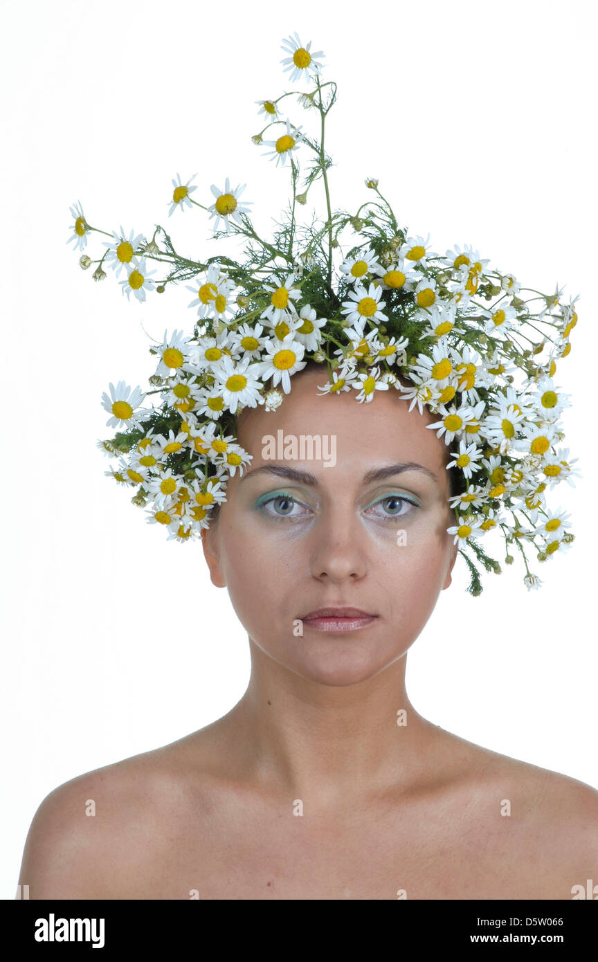 Woman hair decorated with chamomile Stock Photo - Alamy
