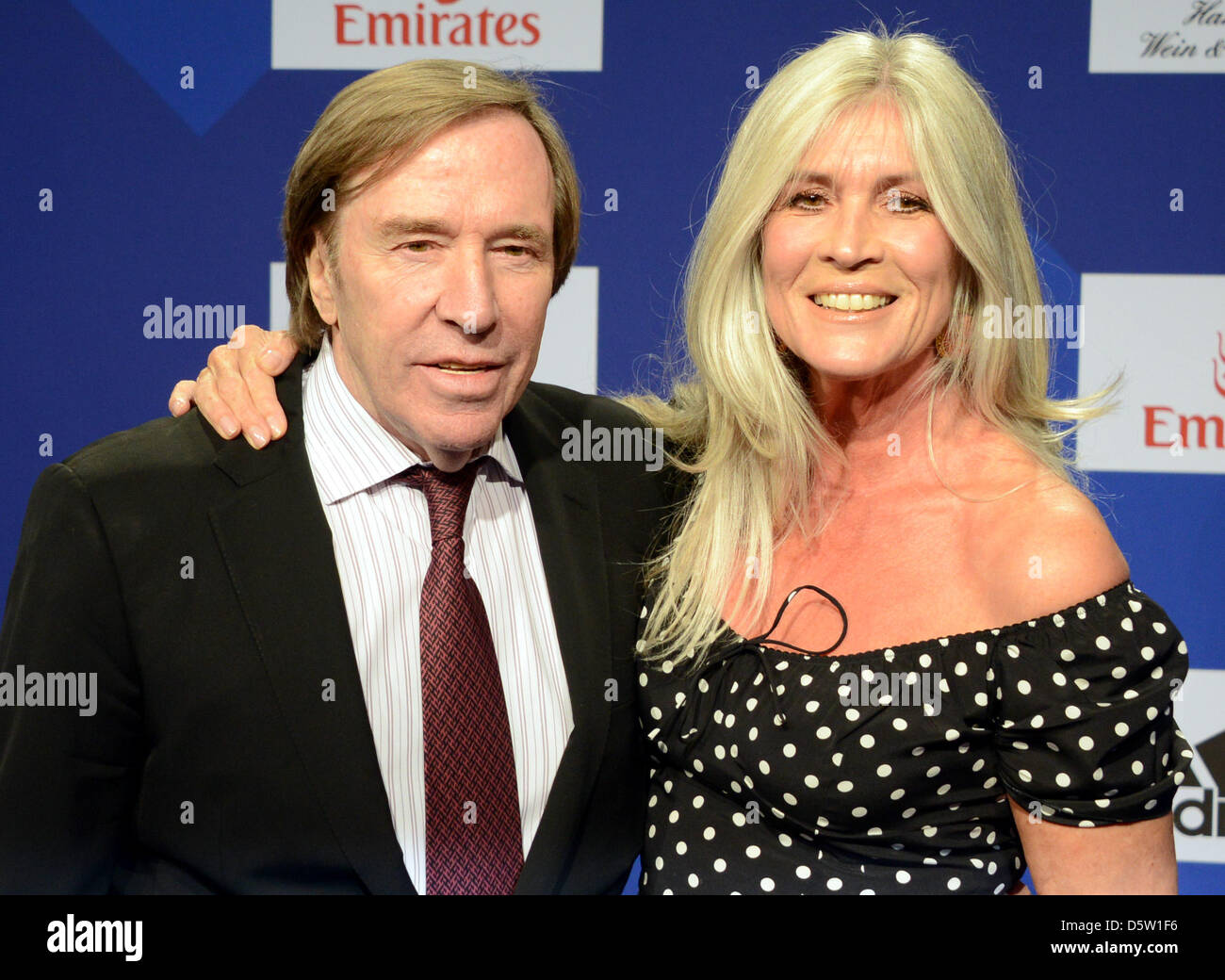 Soccer legend Guenther Netzer and his wife Elvira pose during the ...