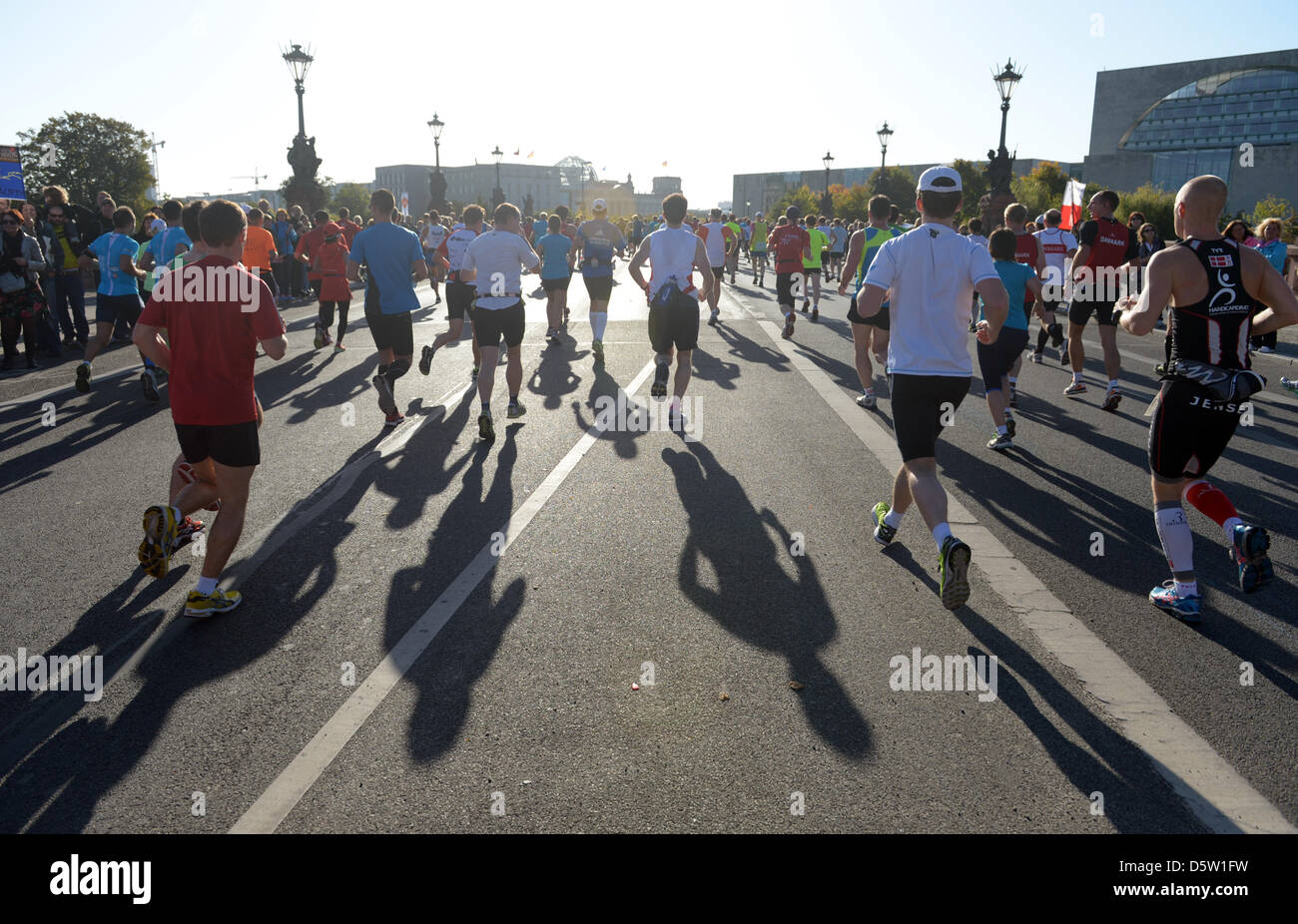 A field of runners is at the Reichstag building in Berlin, Germany, 30 ...