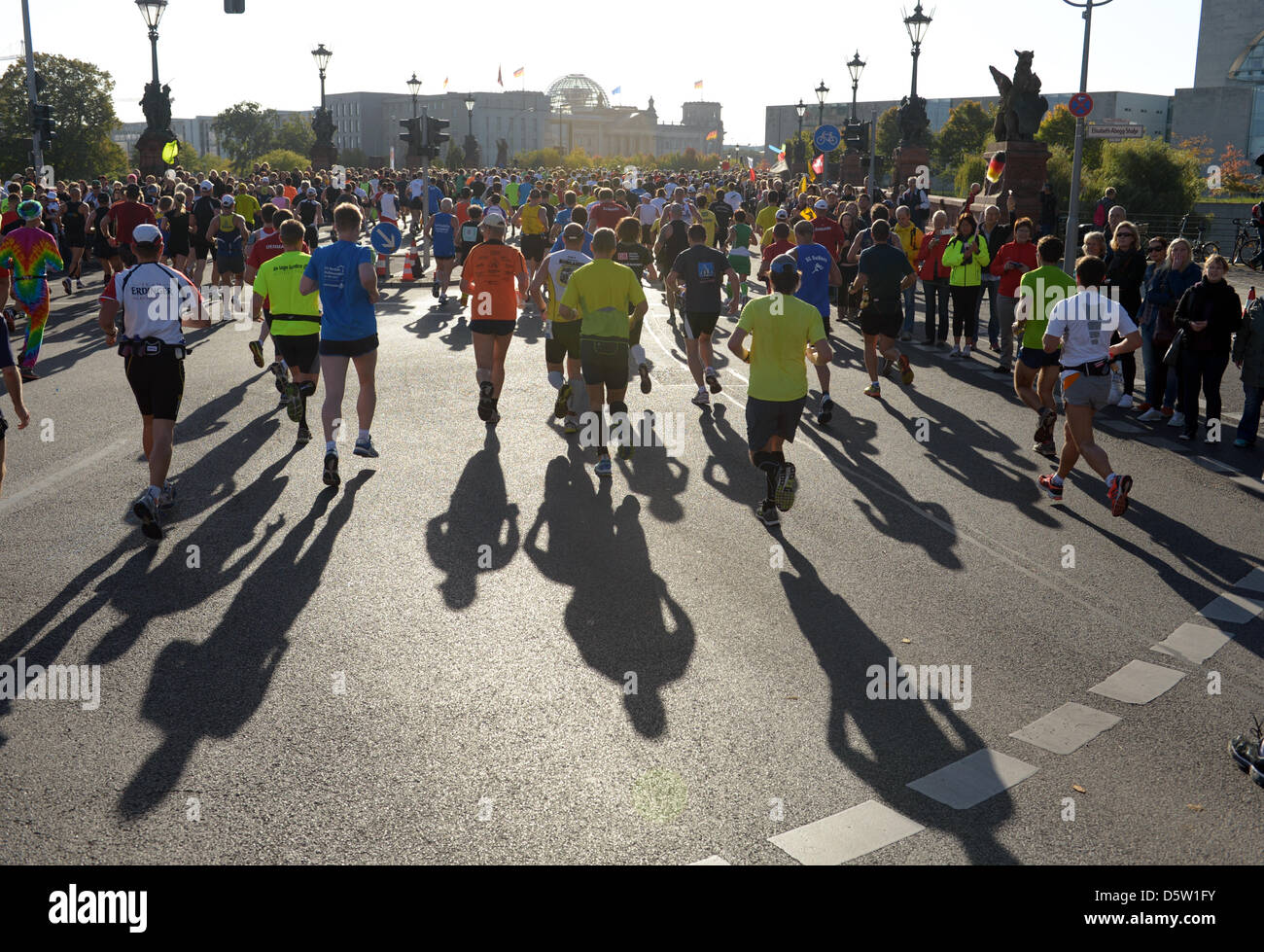 A field of runners is at the Reichstag building in Berlin, Germany, 30 ...
