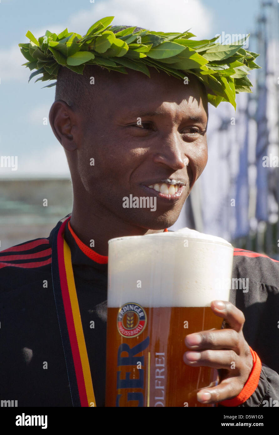 Geoffrey Mutai from Kenia wins first place at the 39th Berlin Marathon ...