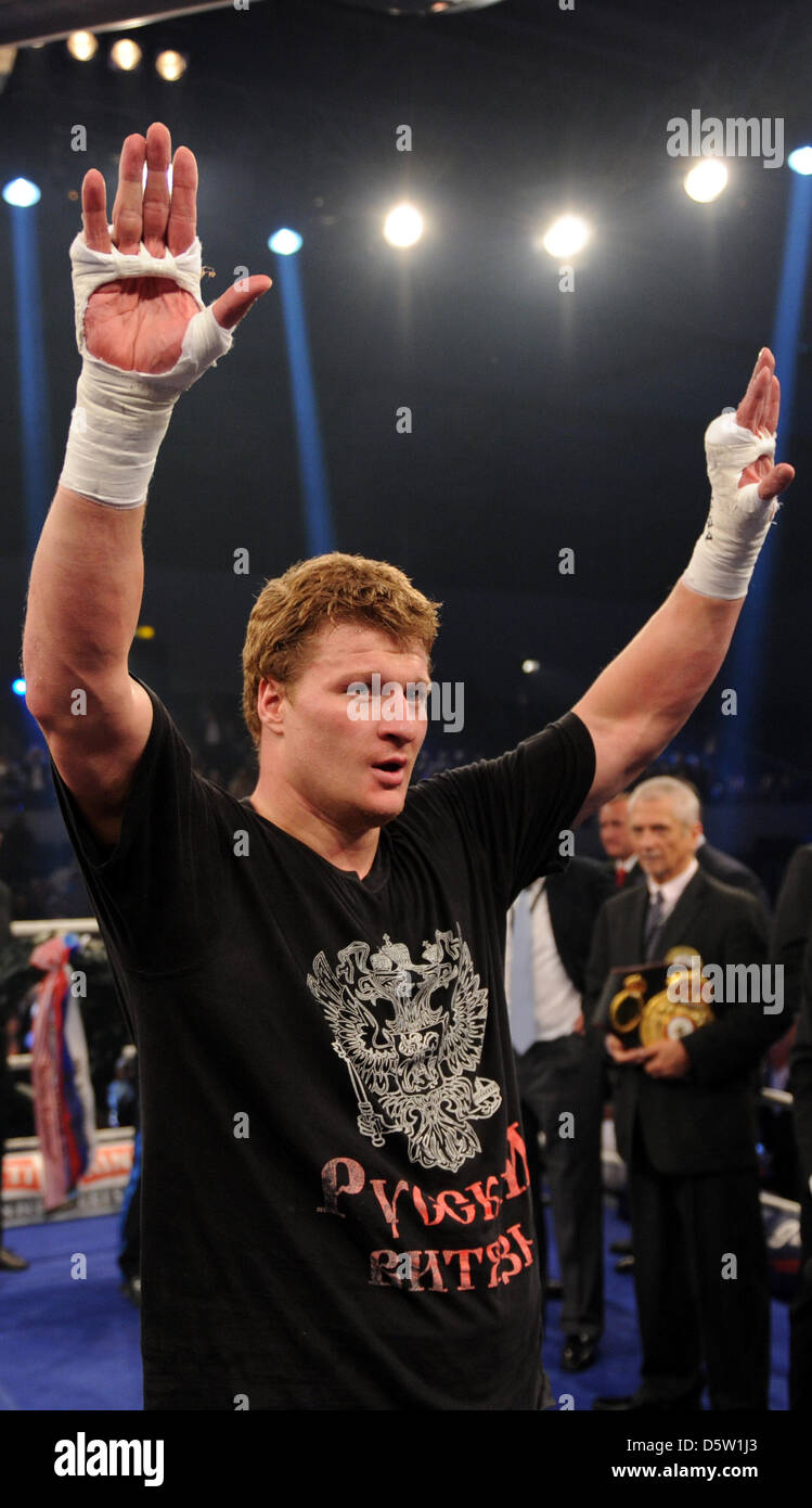 Russian heavy-weight boxer Alexander Powetkin cheers after his victory ...