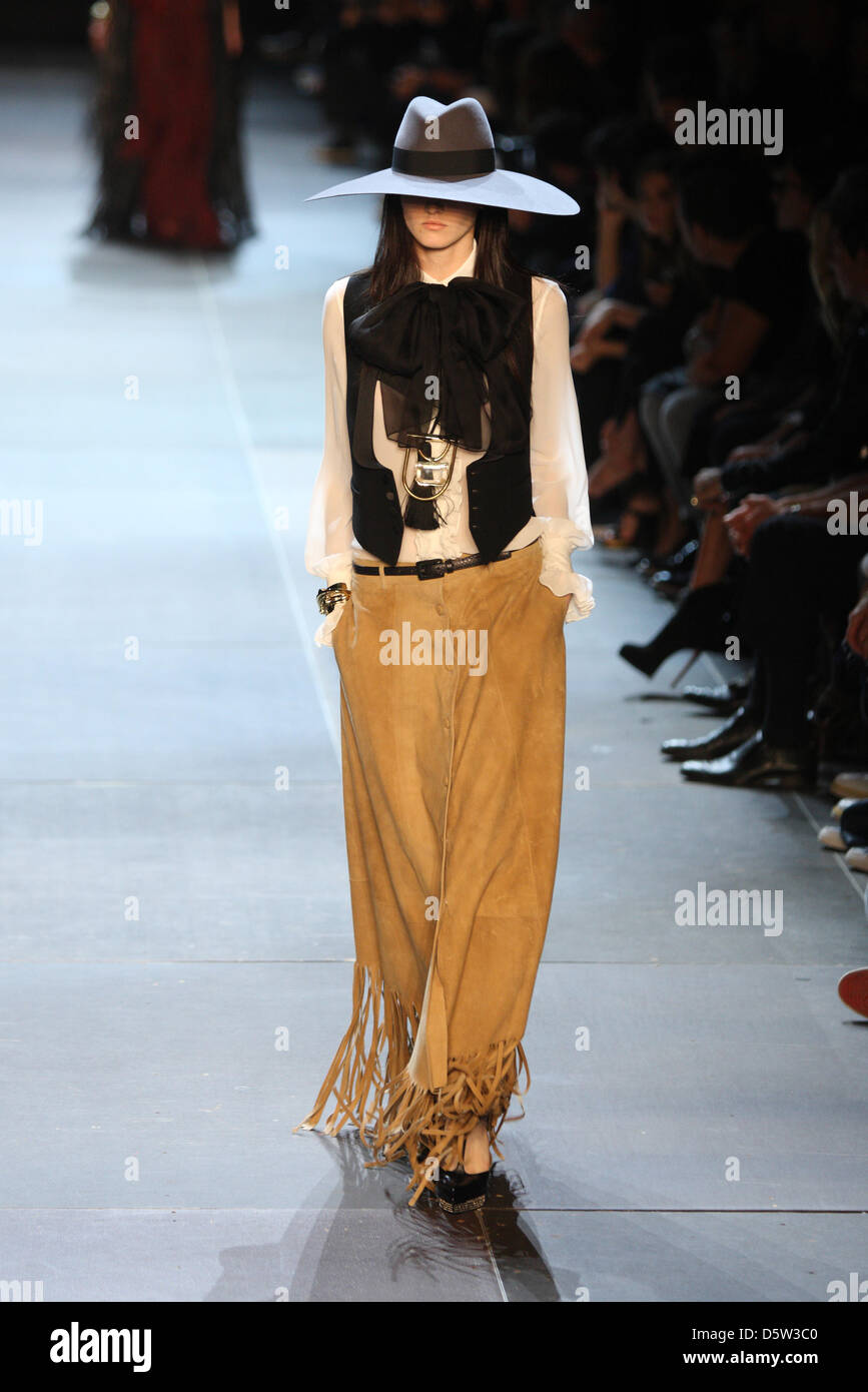 A model wears a creation by French designer Hedi Slimane as part of the ...