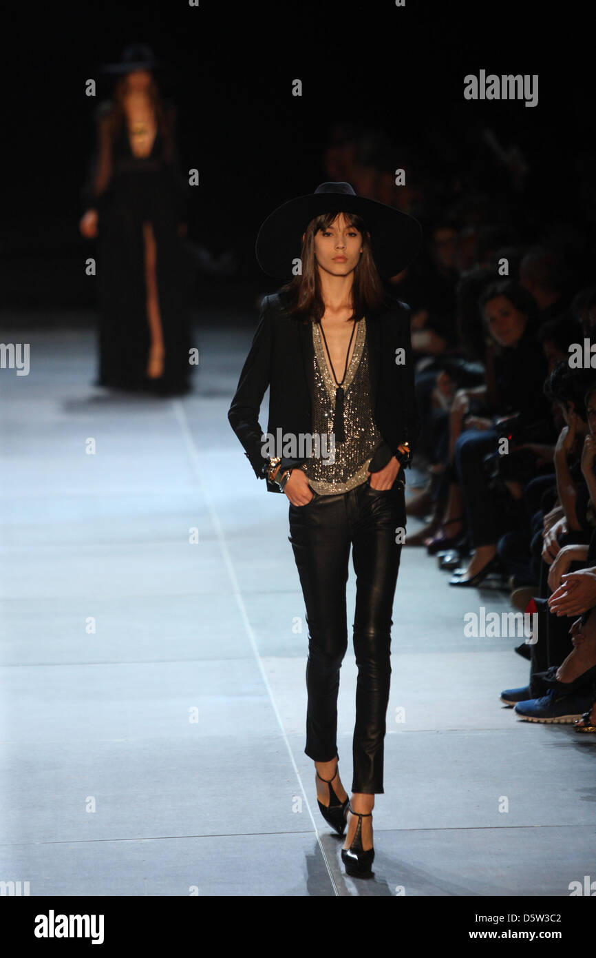 A model wears a creation by French designer Hedi Slimane as part of the ...