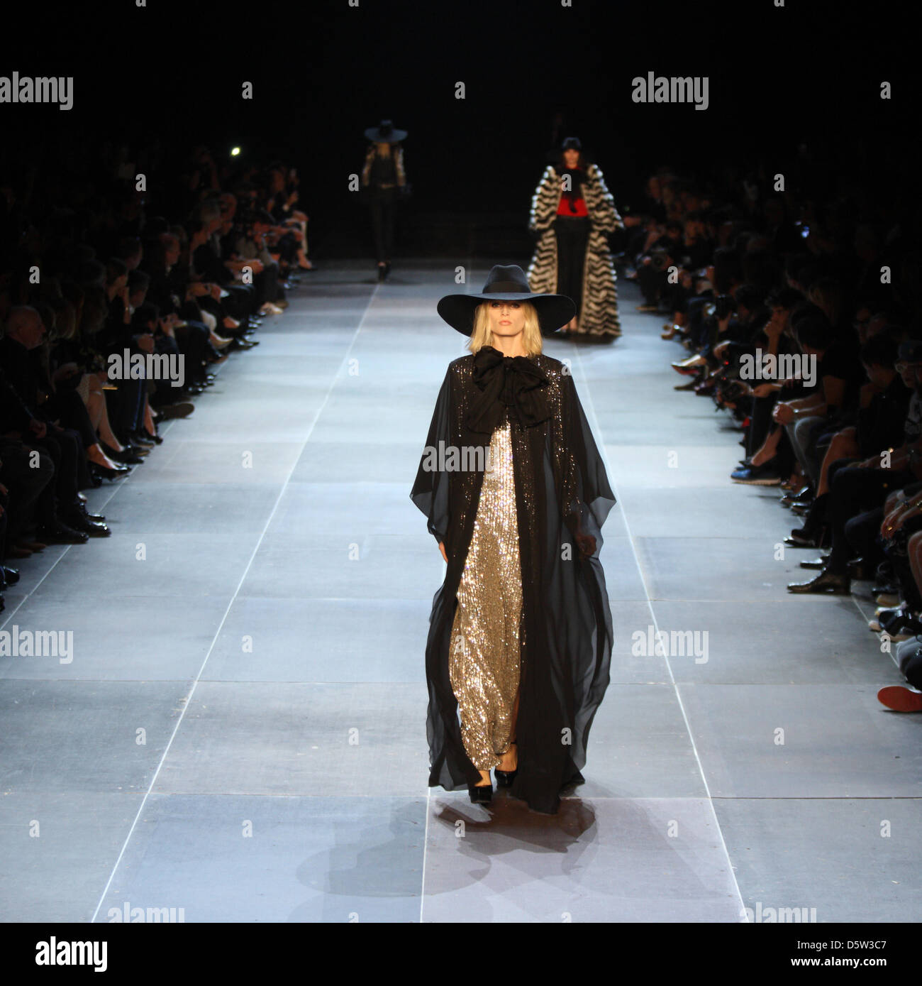 A model wears a creation by French designer Hedi Slimane as part of the ...