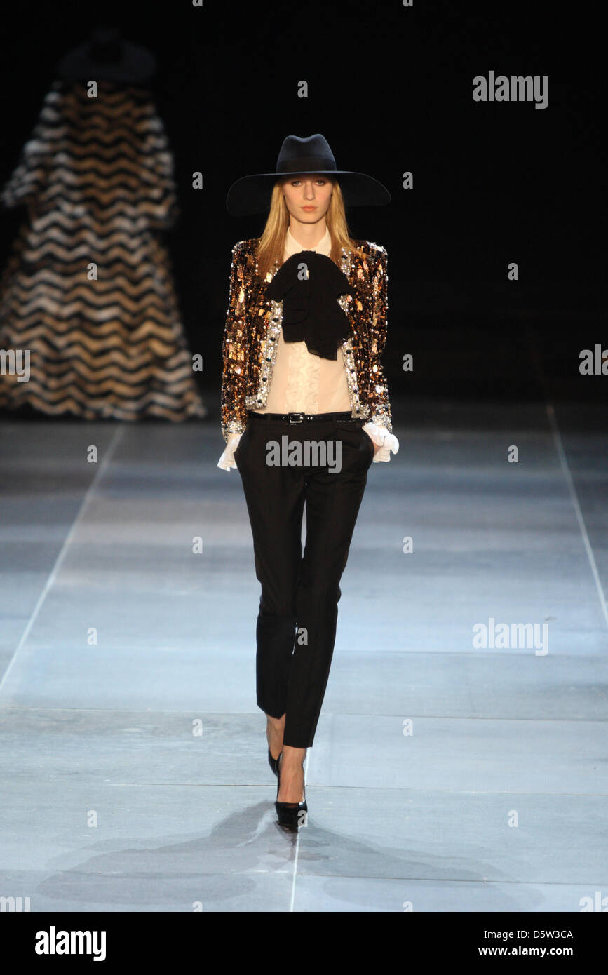 A model wears a creation by French designer Hedi Slimane as part of the ...