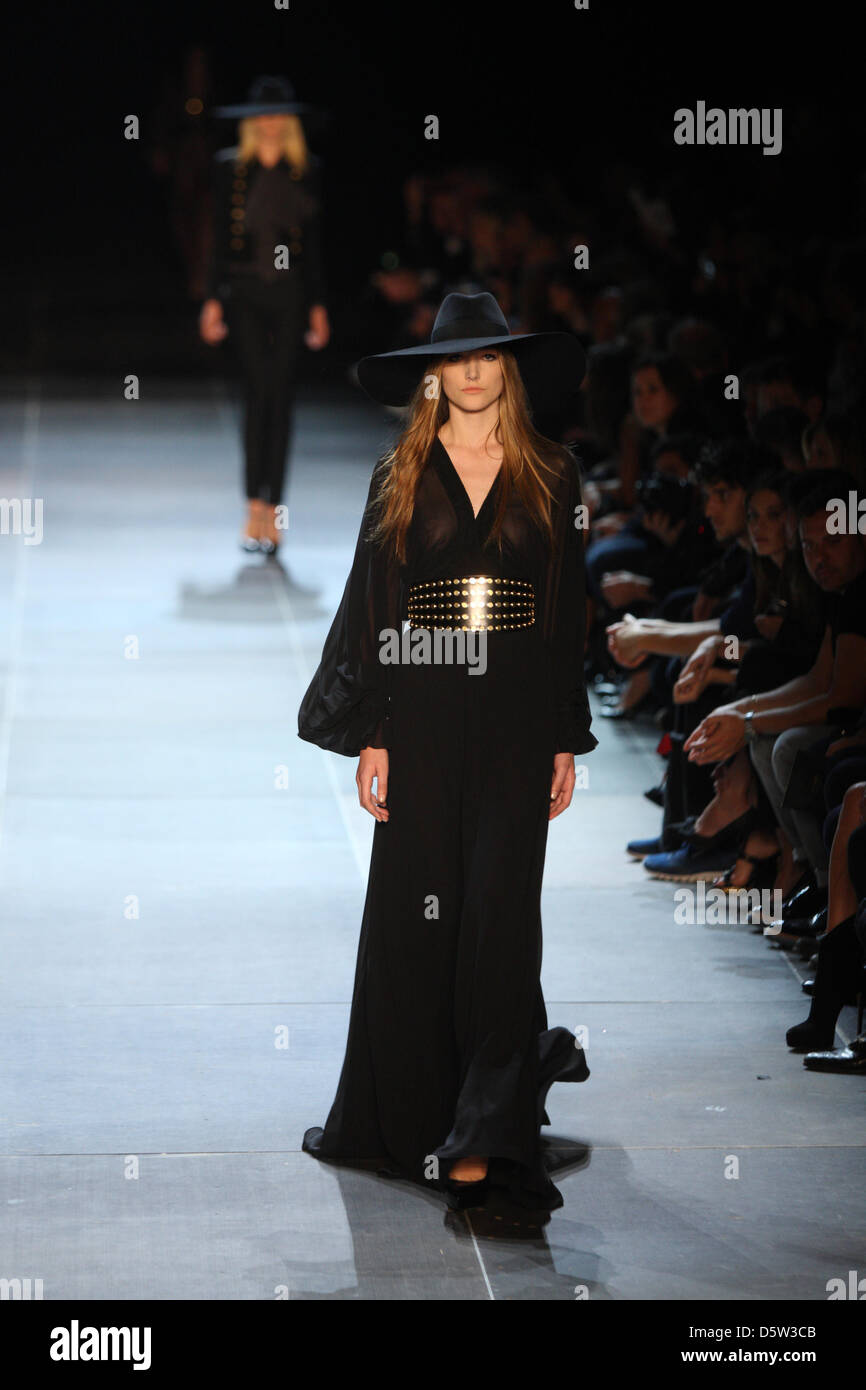 A model wears a creation by French designer Hedi Slimane as part of the ...