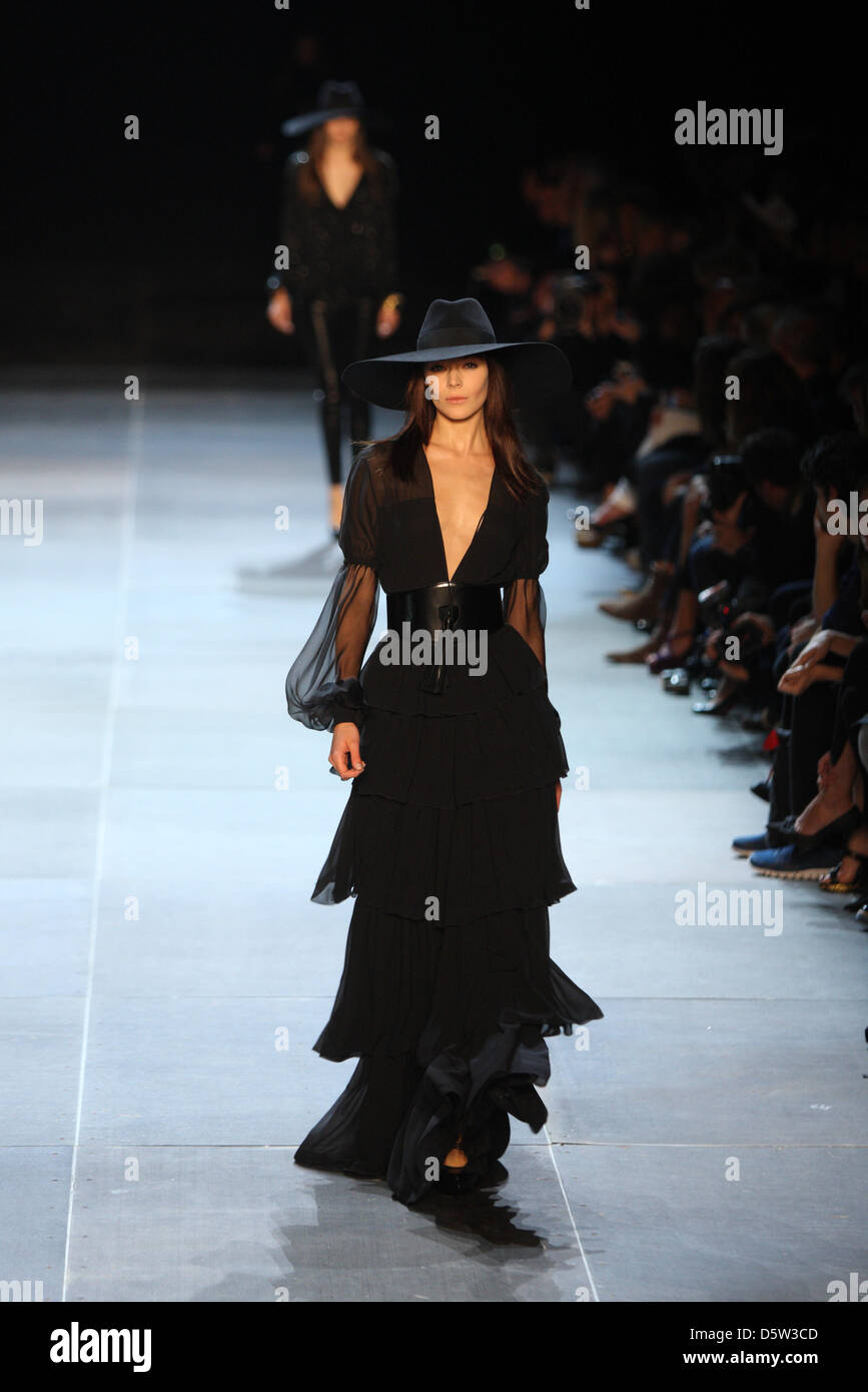 A model wears a creation by French designer Hedi Slimane as part of the ...
