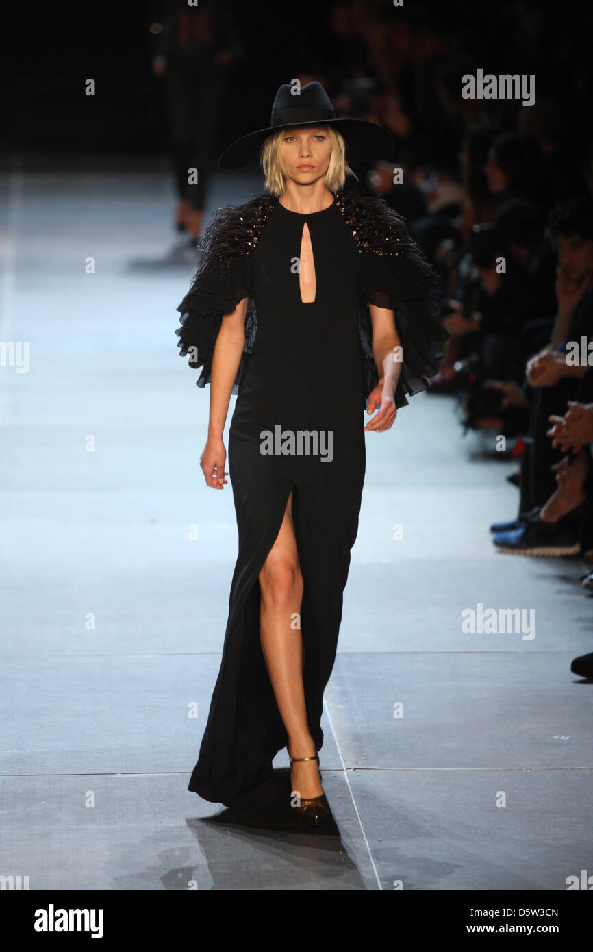 A model wears a creation by French designer Hedi Slimane as part of the ...