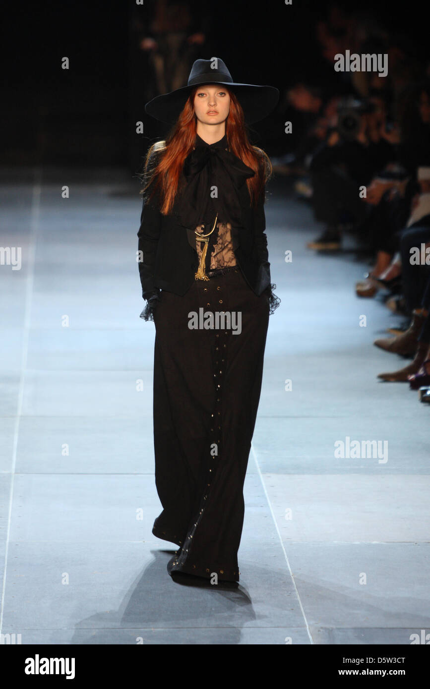 A model wears a creation by French designer Hedi Slimane as part of the ...