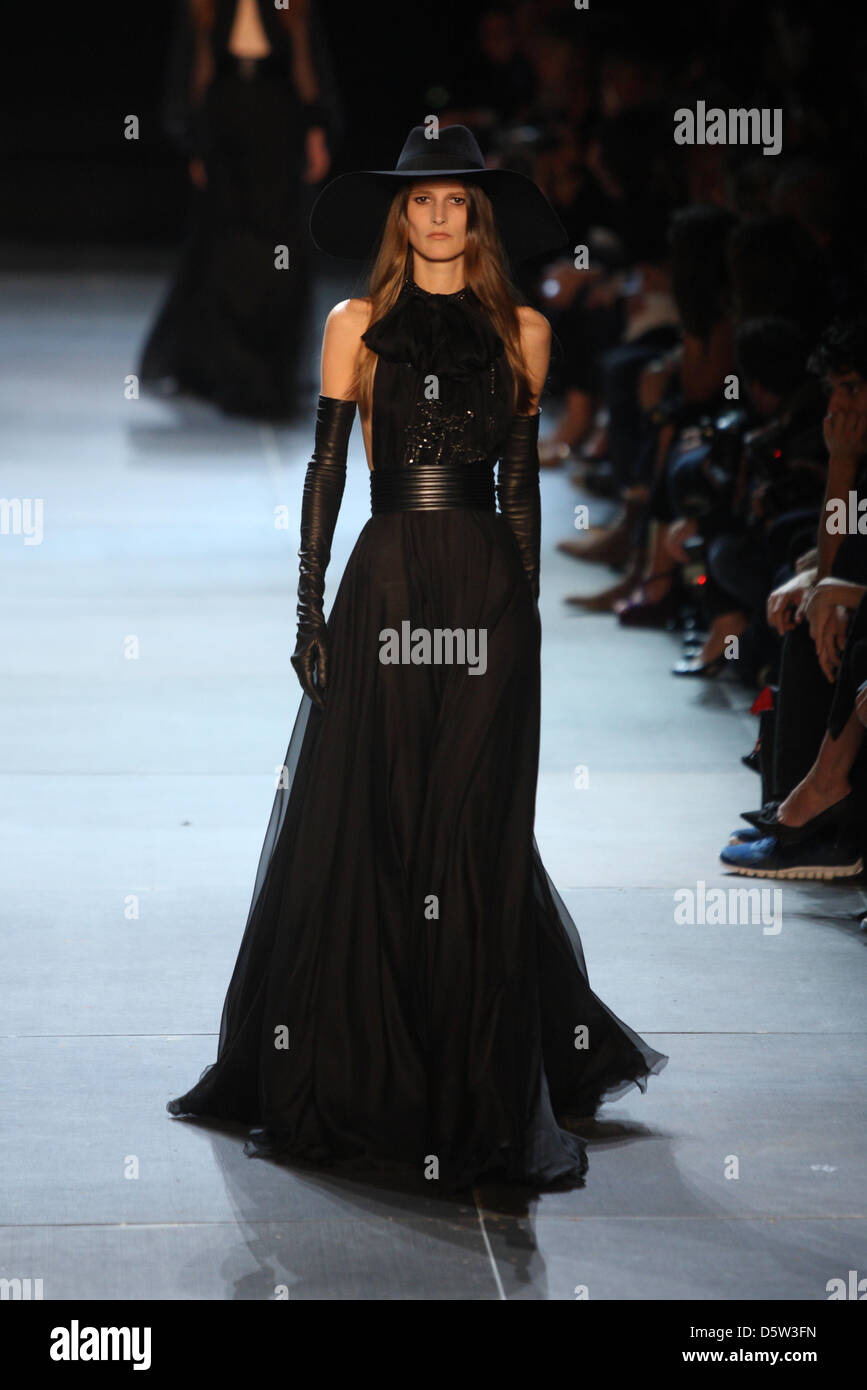 A model wears a creation by French designer Hedi Slimane as part of the ...