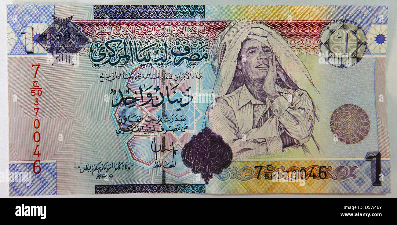 The portrait of the old dictator Gaddafi adorns a few banknotes like ...