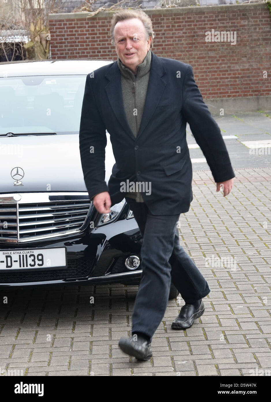 Barry Devlin outside The Church of Miraculous Medal for the Funeral ...