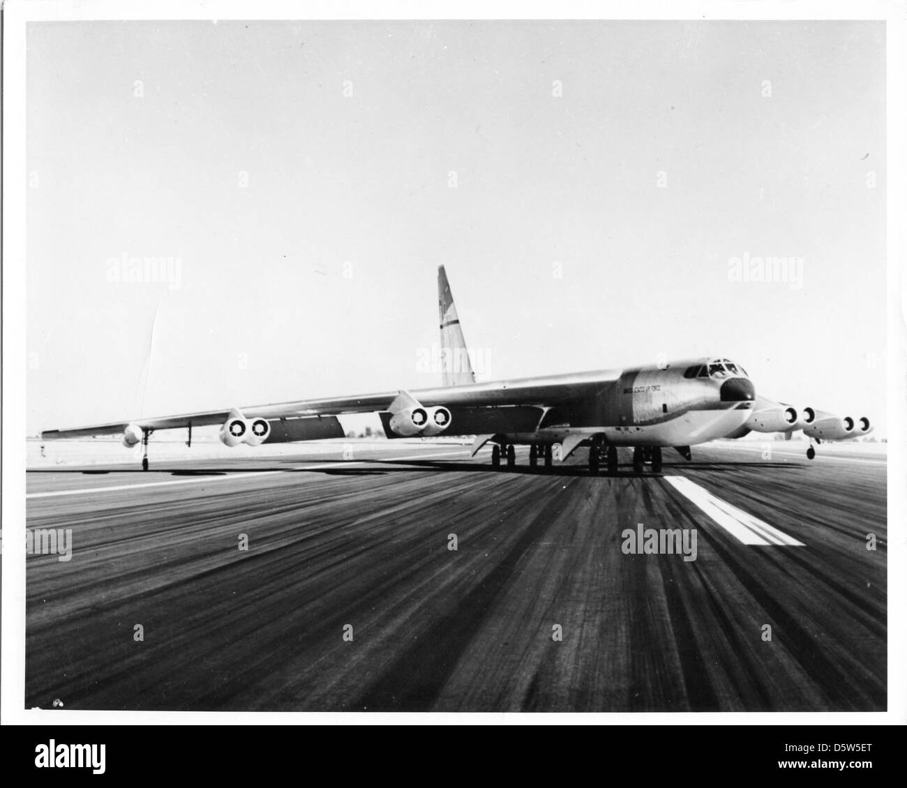 A Boeing B-52 Stratofortress performs a cross-wind crab landing, a ...
