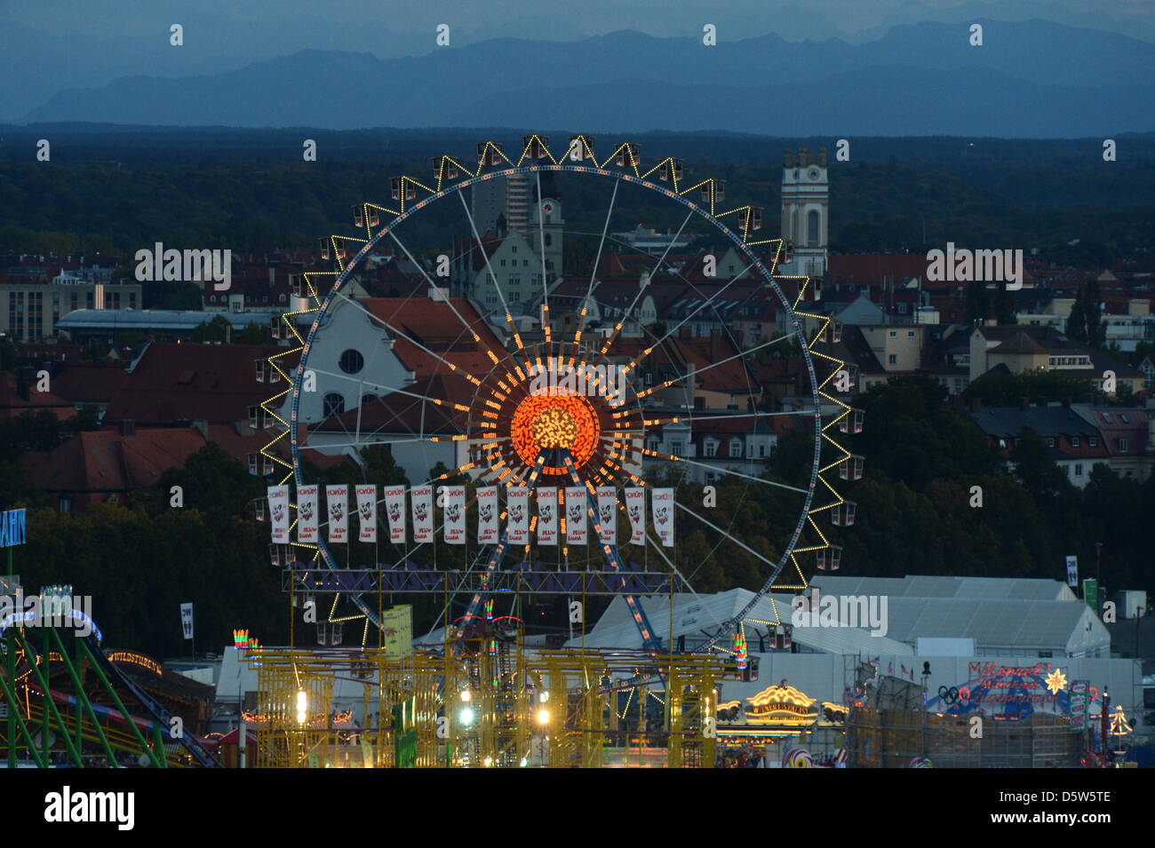 A ferris wheel is illuminated at the Octoberfest in Munich, Germany, 03 ...