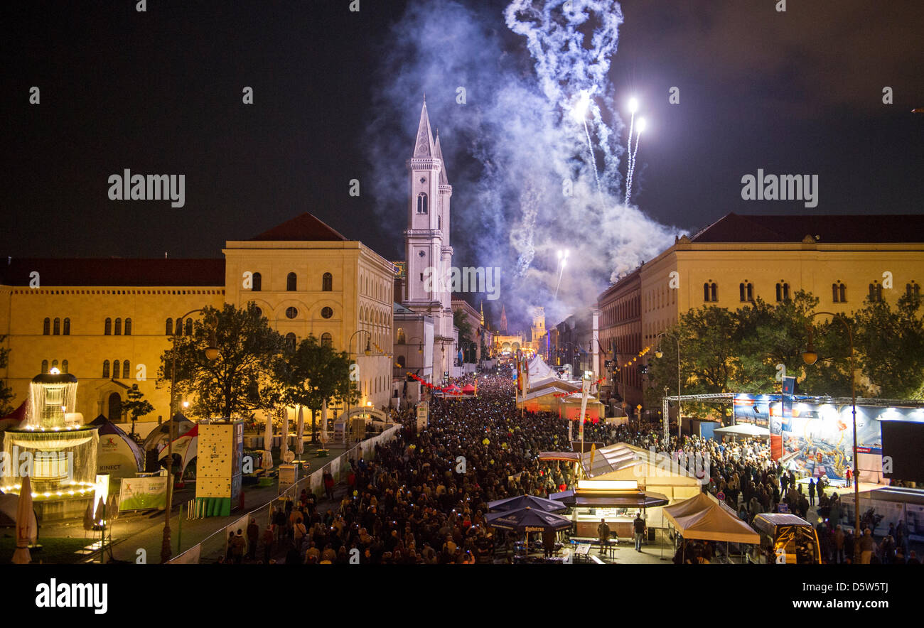 Numerous visitors watch a closing event with fireworks during ...