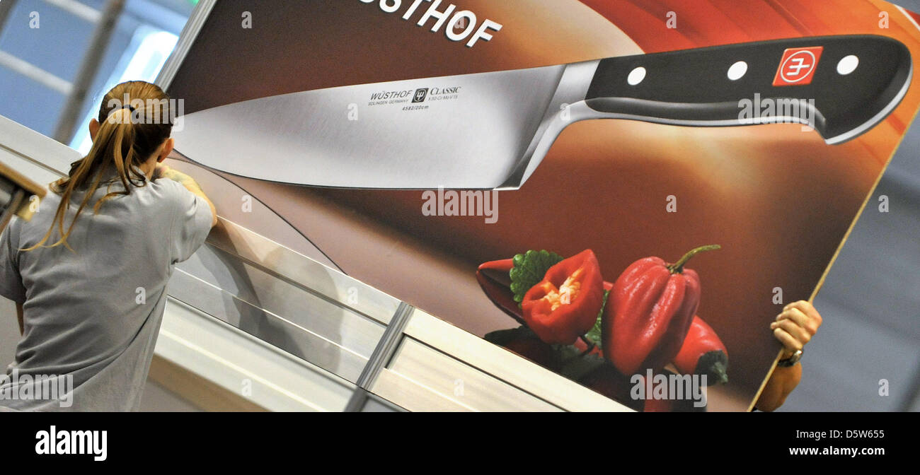 An exhibbition booth is being prepared for the International Cooking ...