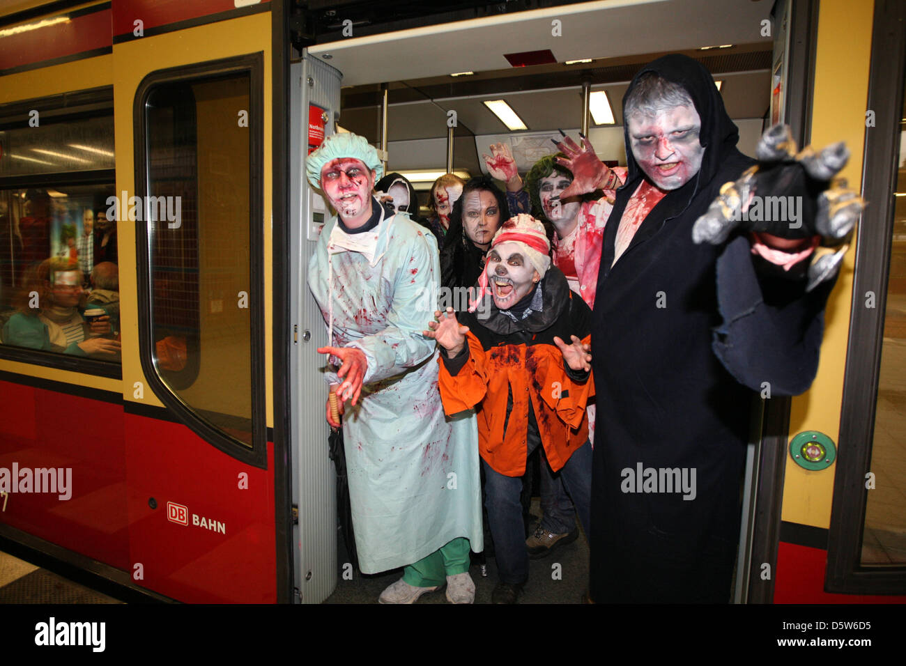 People dressed up as monsters take the city train from Potsdam ...