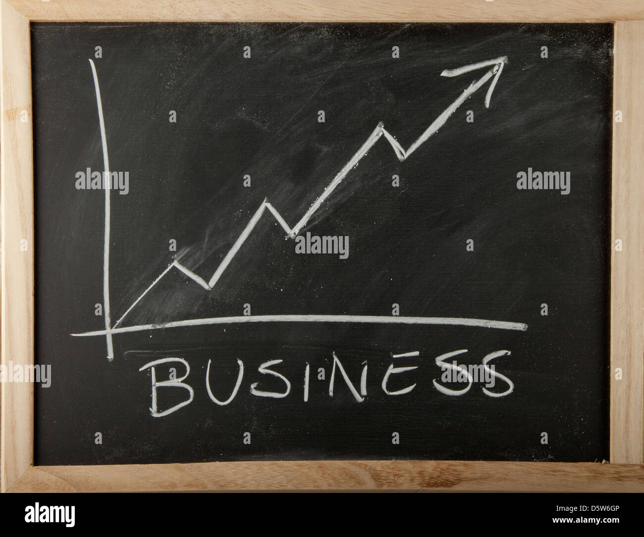 A blackboard with graph of increasing business Stock Photo - Alamy
