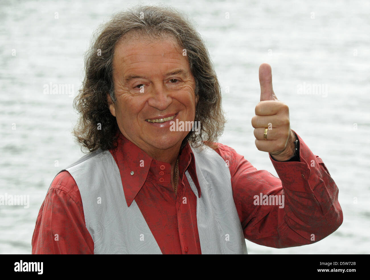 EXCLUSIVE: British pop singer Chris Andrews poses on a pier on Tschern ...