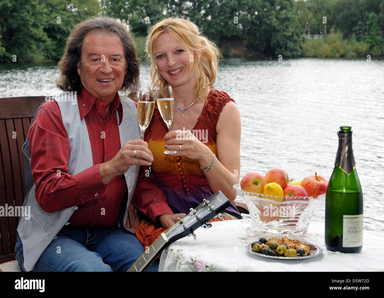 EXCLUSIVE: British pop singer Chris Andrews and his wife Alexandra pose ...