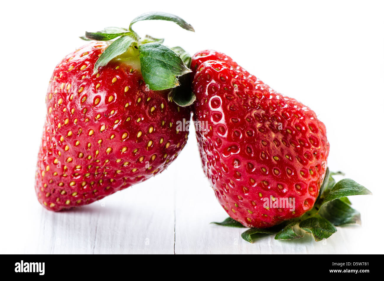 Two strawberries hi-res stock photography and images - Alamy