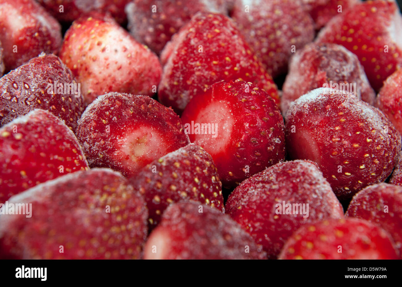 Frozen strawberries sit next to each other in Berlin, Germany, 06 ...