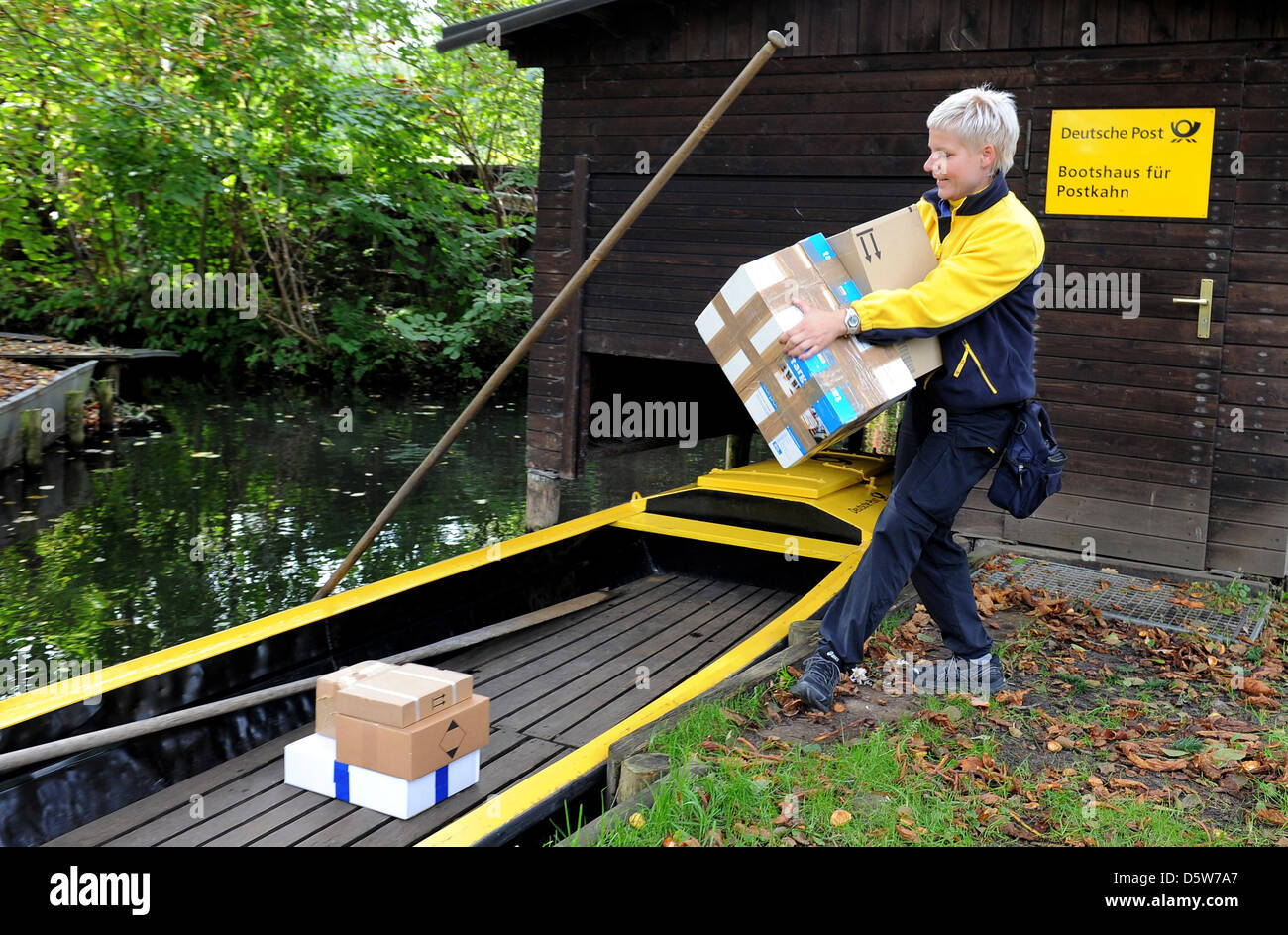 Boat post woman Andrea Bunar loads the post boat for the last trip of ...
