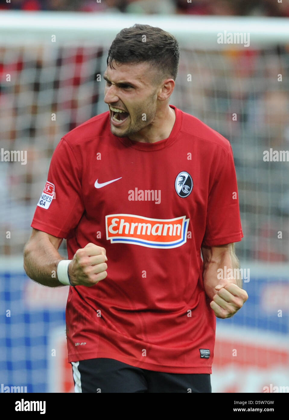 Freiburg's Daniel Caligiuri celebrates his 2-0 goal during the German ...