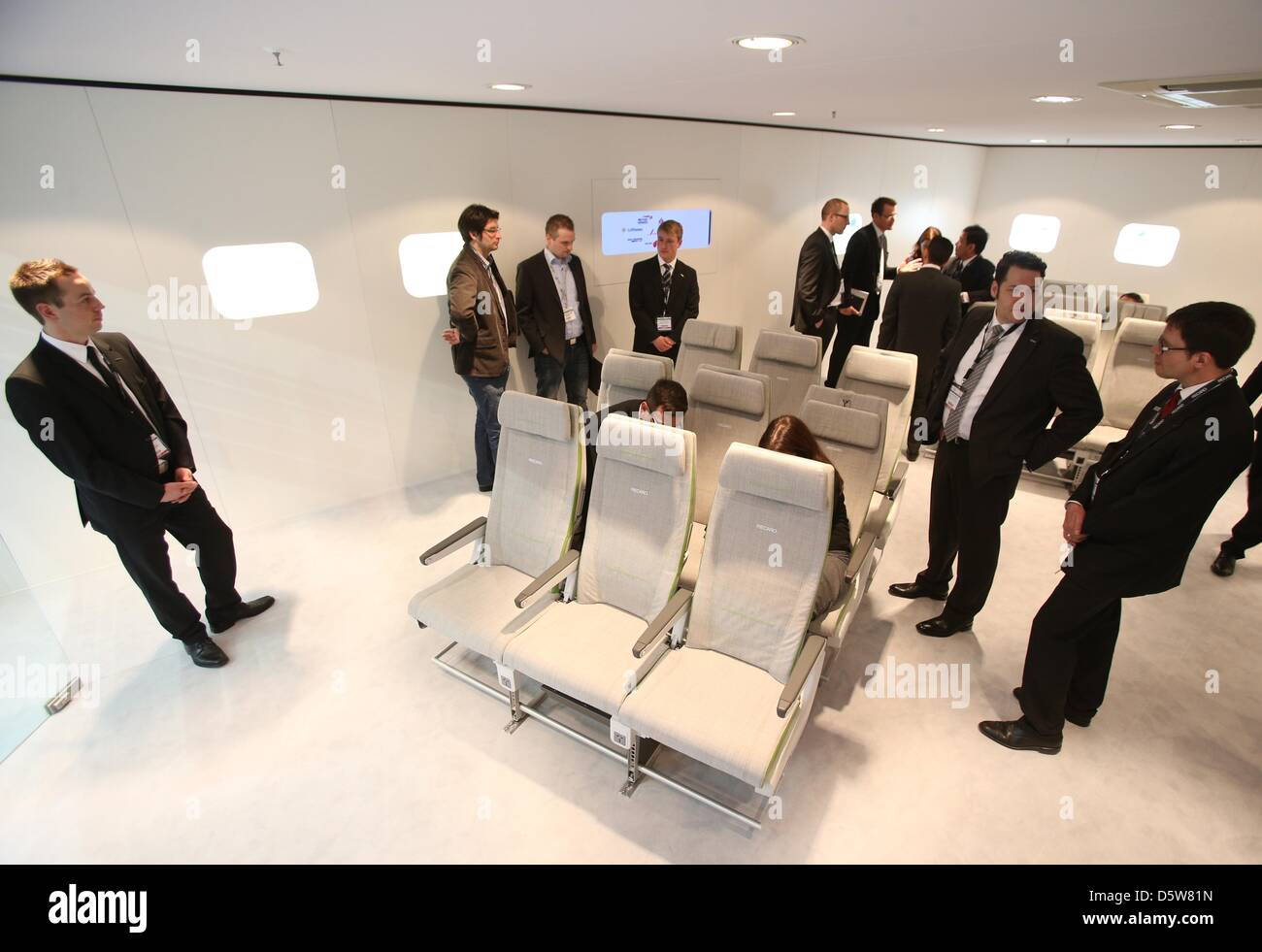 Visitors look economy class seats CL3710 by Recaro at the Aircraft ...