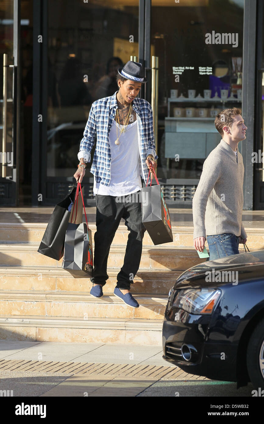 Rapper Wiz Khalifa shopping at Barney's New York in Beverly Hills on ...