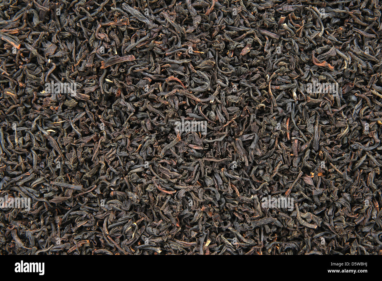 Black tea leaves background. Abstract food textures Stock Photo - Alamy