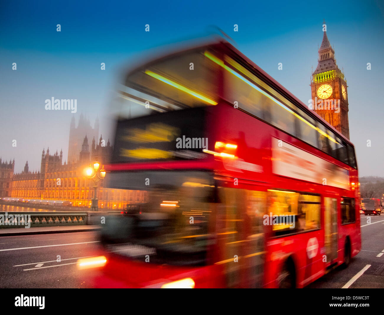 Big Ben with the Houses Of Parliament and a red double-decker bus ...